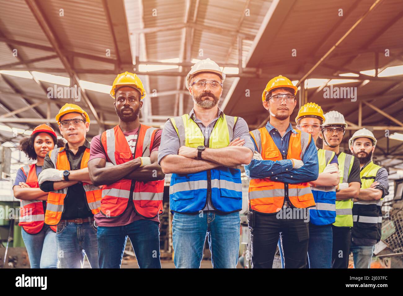 Group of Worker Engineer Teamwork people mix race in Heavy Industry ...