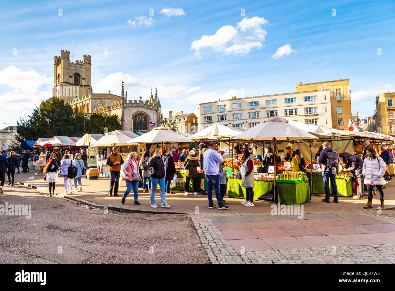 Stalls at Cambridge Market Square with Great St Mary's Church in the ...