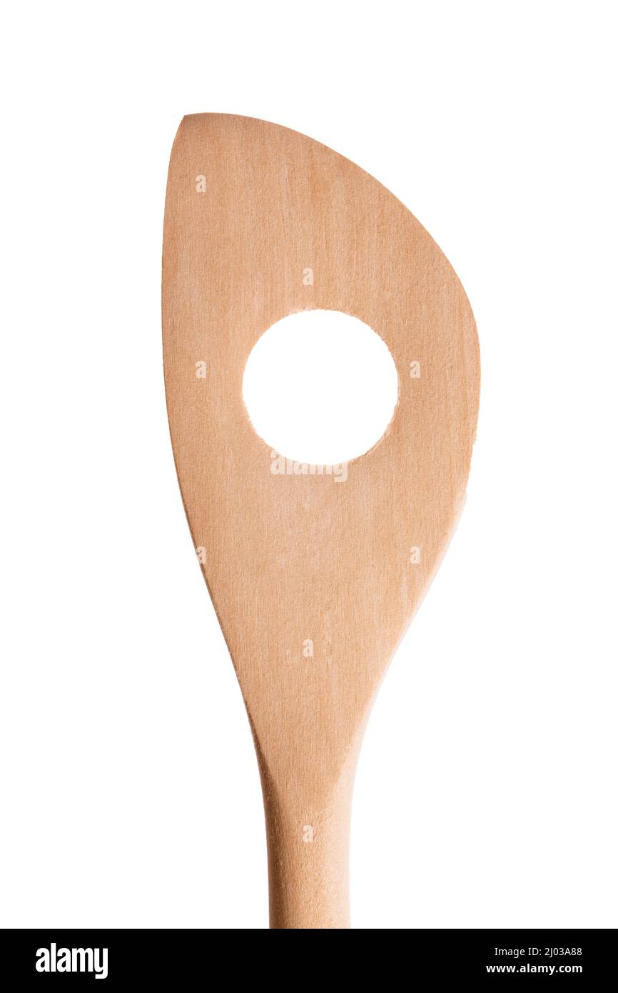 Close-up shot of wooden kitchen utensil with hole, isolated on white ...