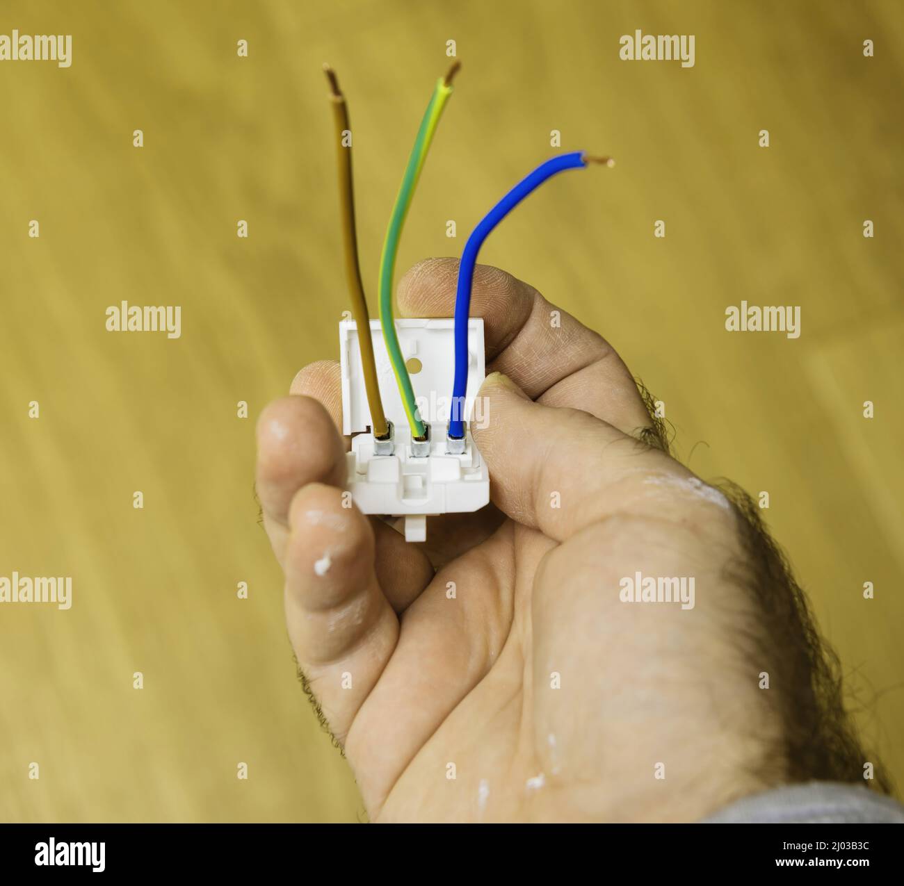 POV male hand holding during renovation reconstruction lamp ...