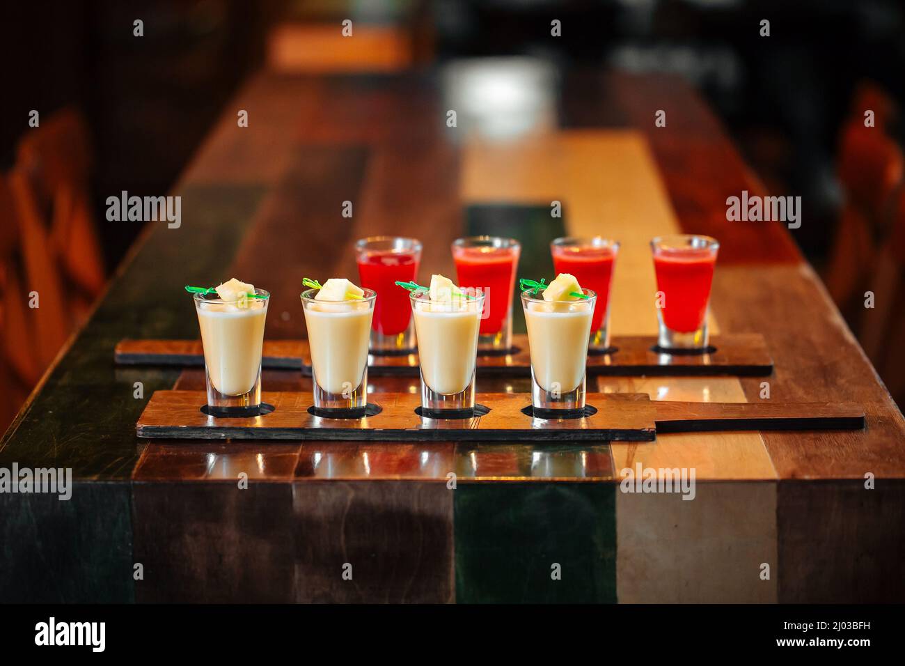 Sweet alcohol liqueur cocktail shots Stock Photo - Alamy