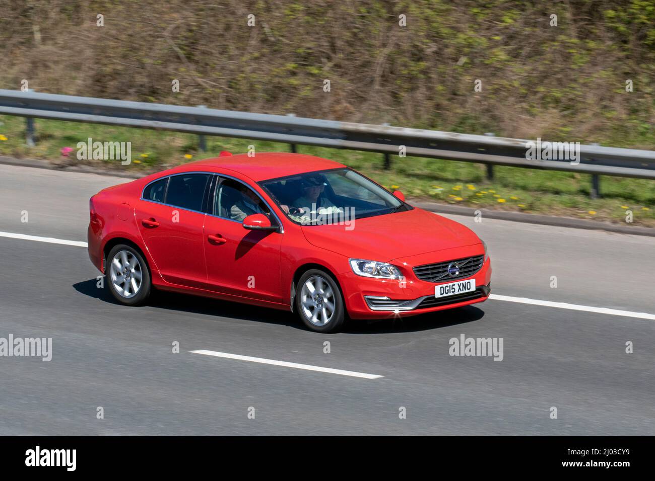 2015 red Volvo S60 D4 R-DESIGN LUX NAV 1969cc diesel 8 speed automatic driving on the M61 ...
