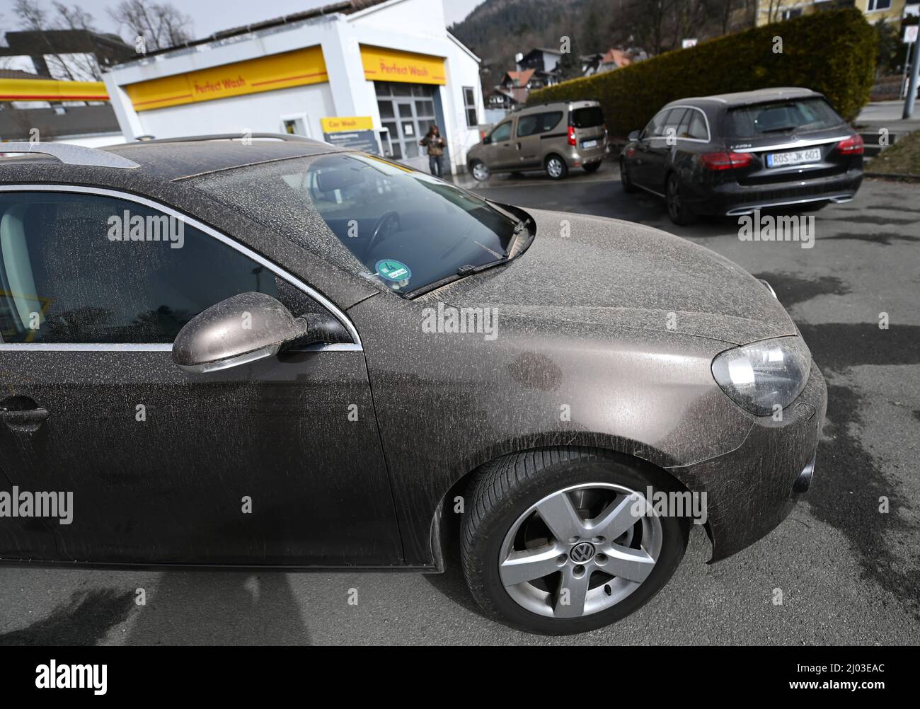 Garmisch Partenkirchen, Germany. 16th Mar, 2022. Cars covered in ...