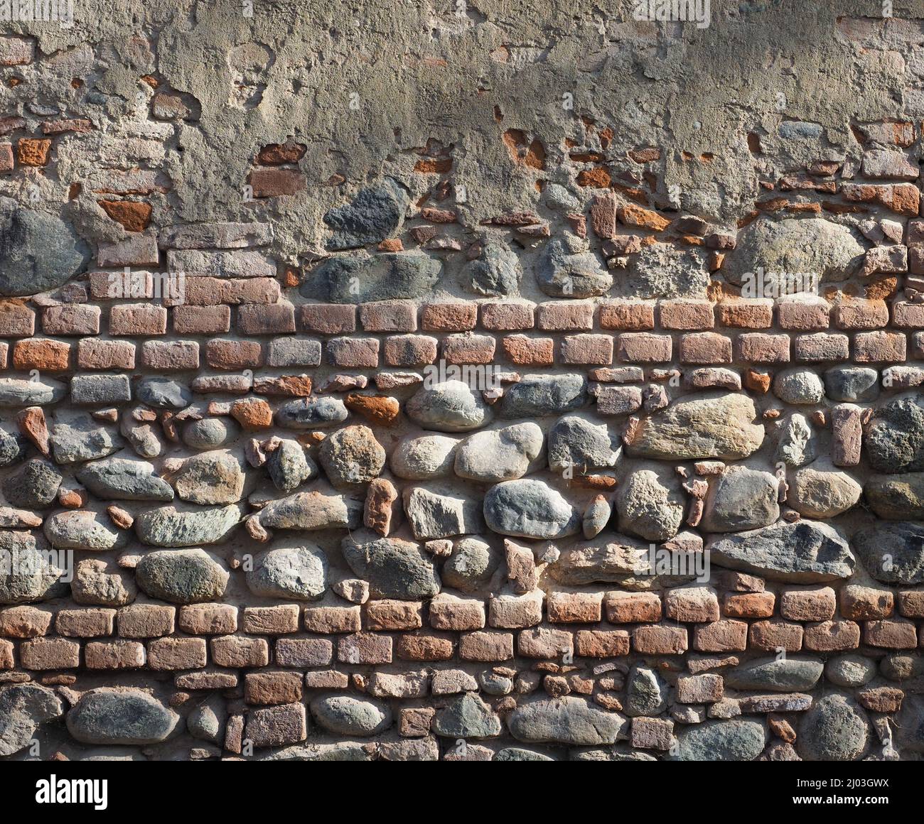 old brick and stone wall useful as a background Stock Photo - Alamy