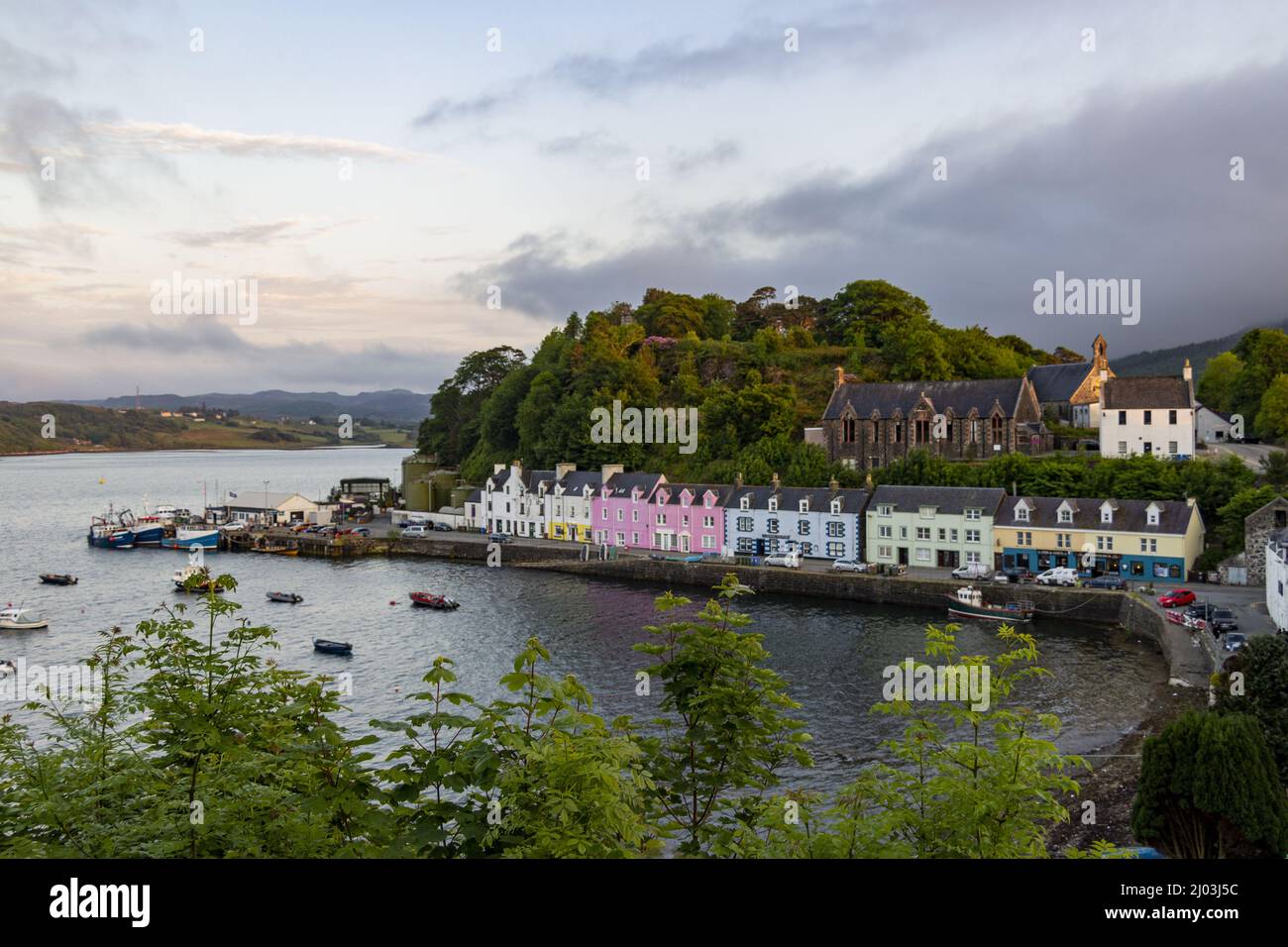 Row of the colorful buildings of the harbor of Portree, Isle of Skye ...