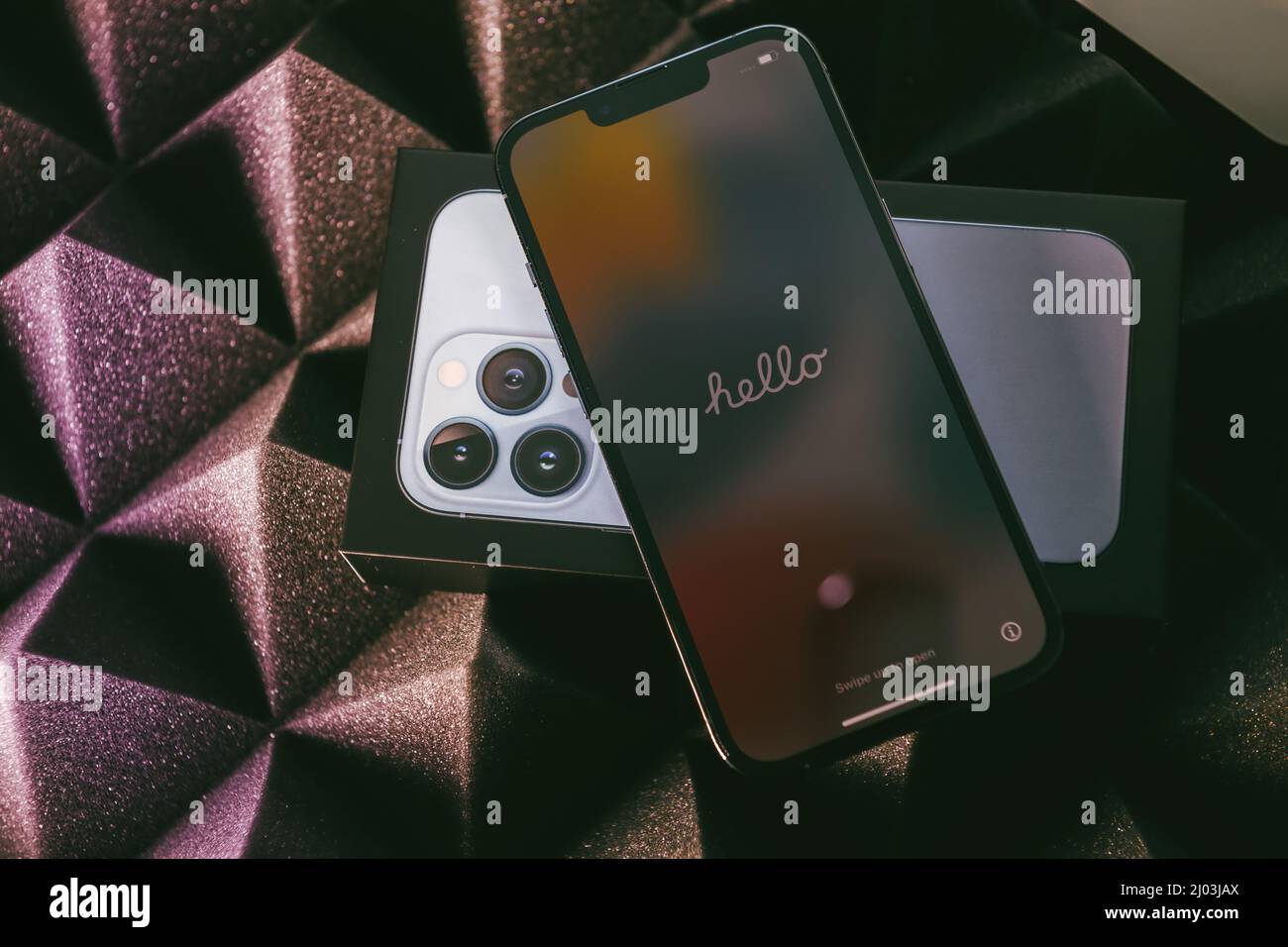 Paris, France - Sep 25, 2021: unboxing of new triple camera iPhone 13 ...