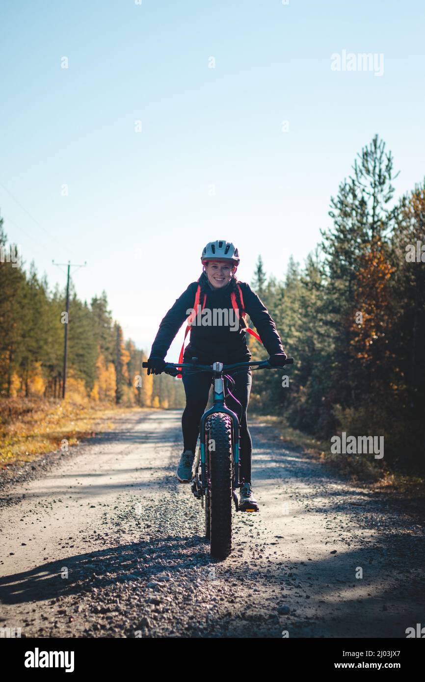 Young likeable lady with a lovely realistic smile while recreationally ...