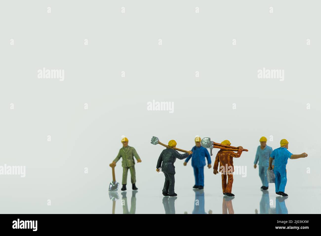 Team building miniature construction workers hi-res stock photography ...