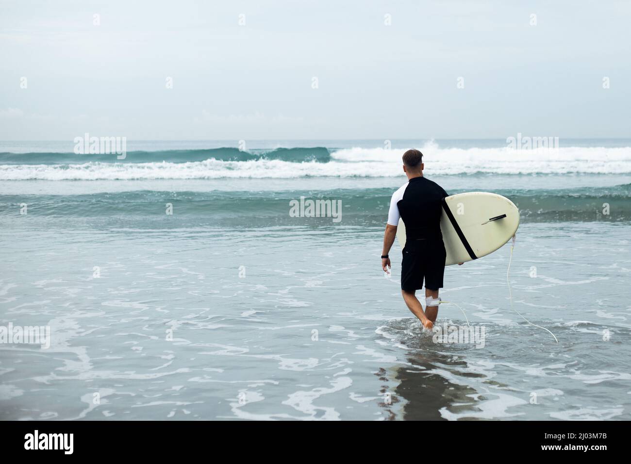 Tourist enjoying the waves hi-res stock photography and images - Alamy