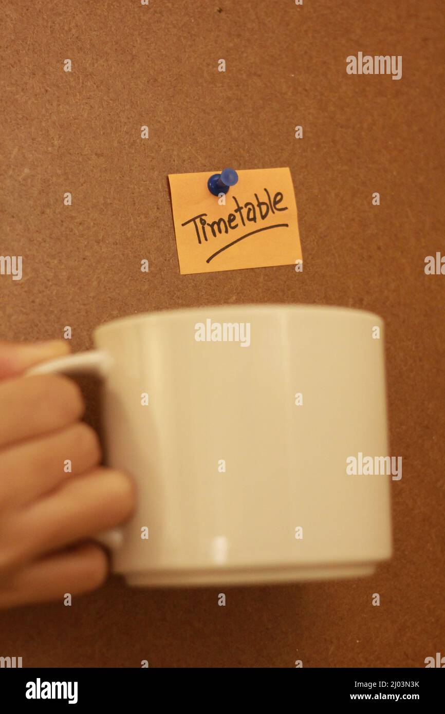 Routine and Timetable written on sticky note concept designed with ...