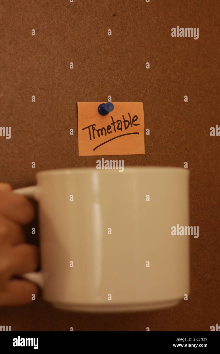 Routine and Timetable written on sticky note concept designed with ...