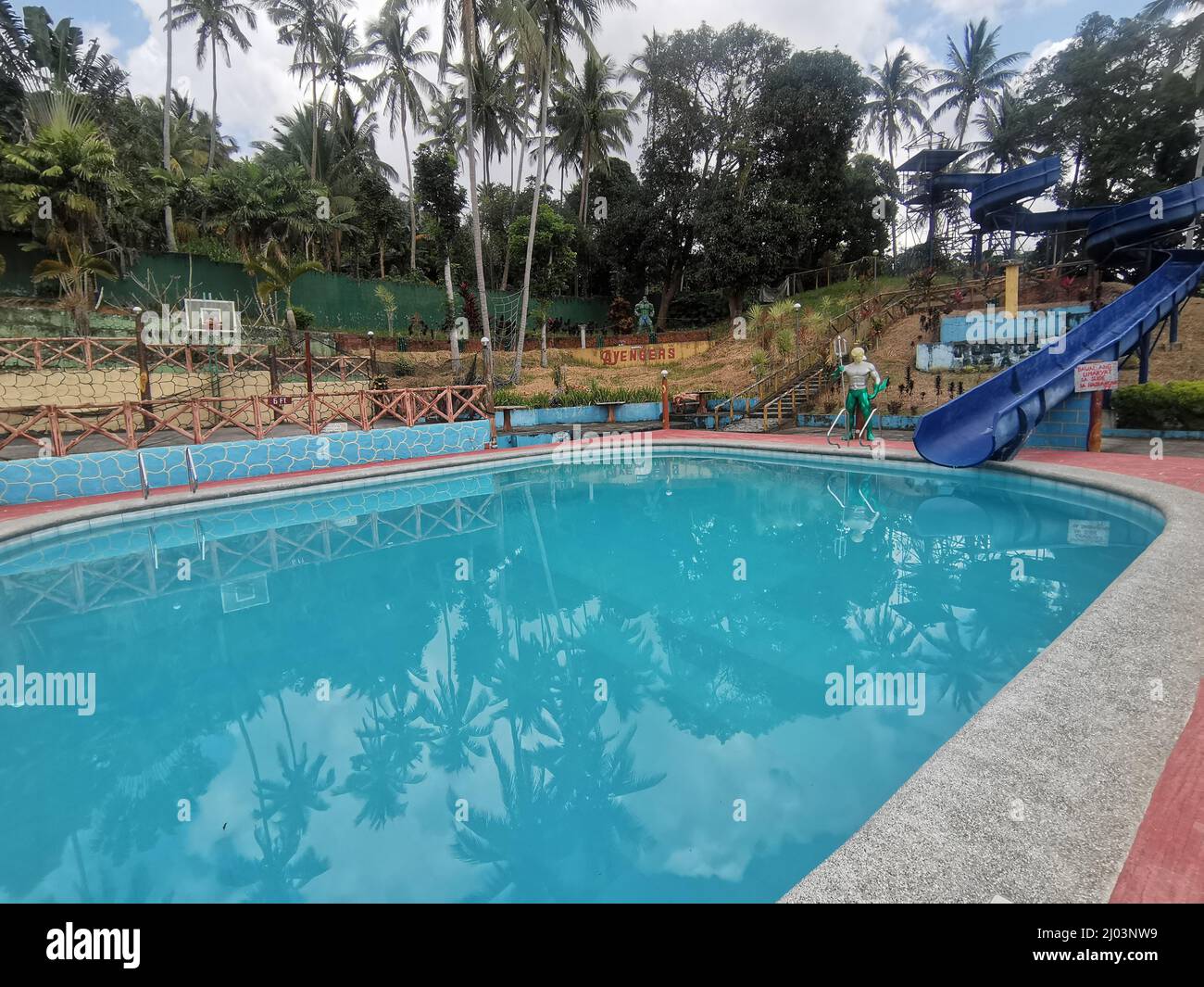 Public pool with a waterslide in Metro Manila, The Philippines Stock ...