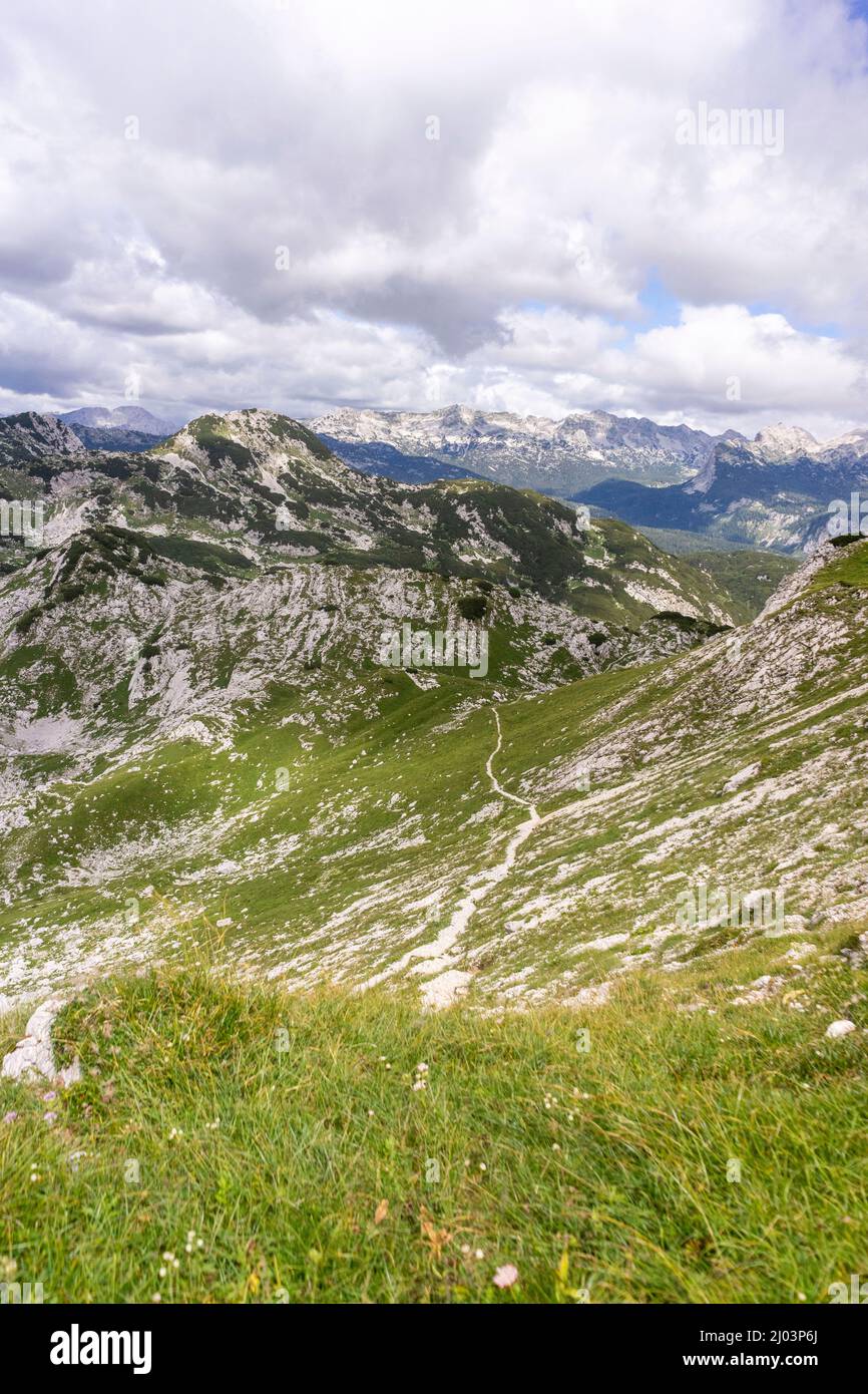 Amazing view of the mountains on a path between Vogel and Komna Stock ...