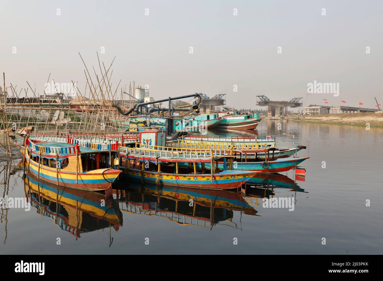 Dhaka, Bangladesh - March 15, 2022: The water of river Balu became ...