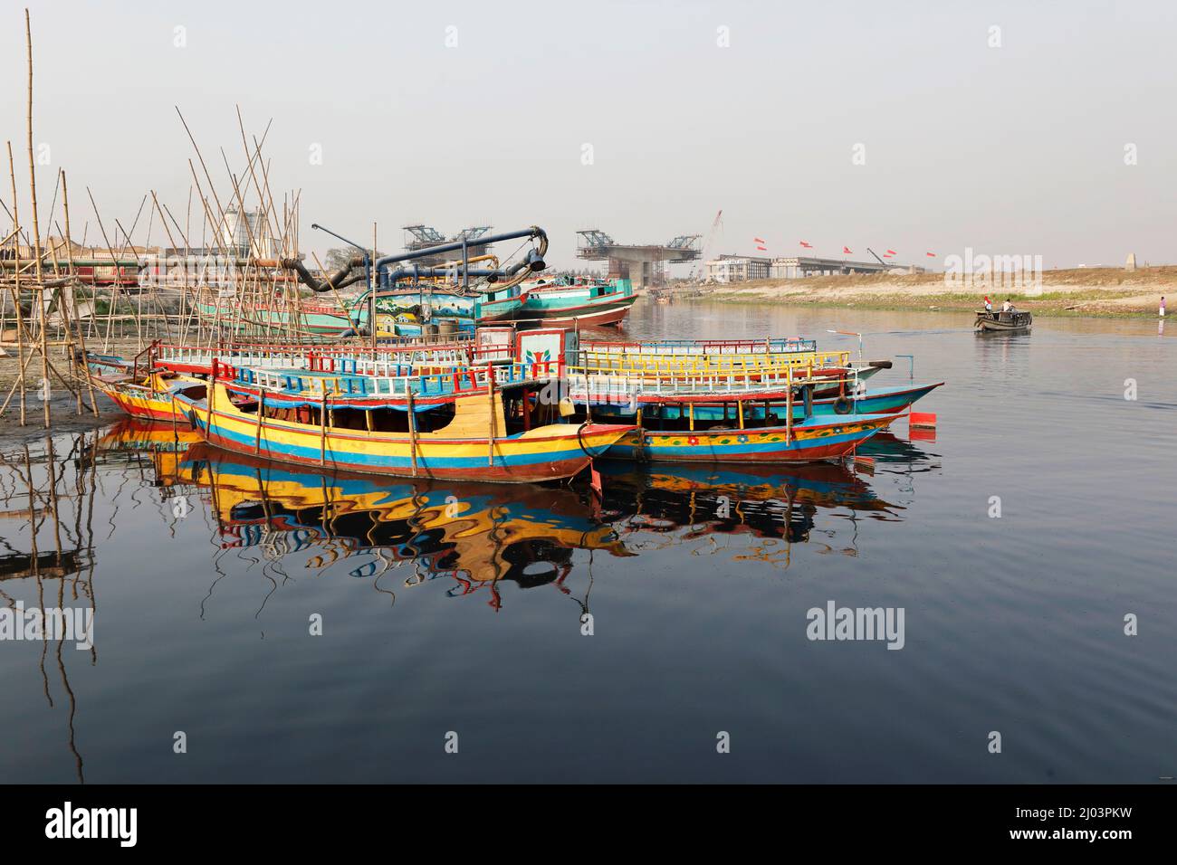 Dhaka, Bangladesh - March 15, 2022: The water of river Balu became ...