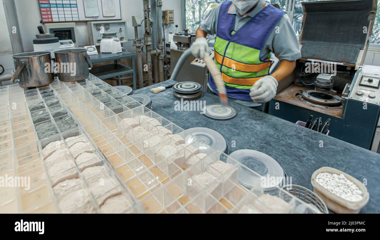 Processing mineral stone in workshop hi-res stock photography and ...