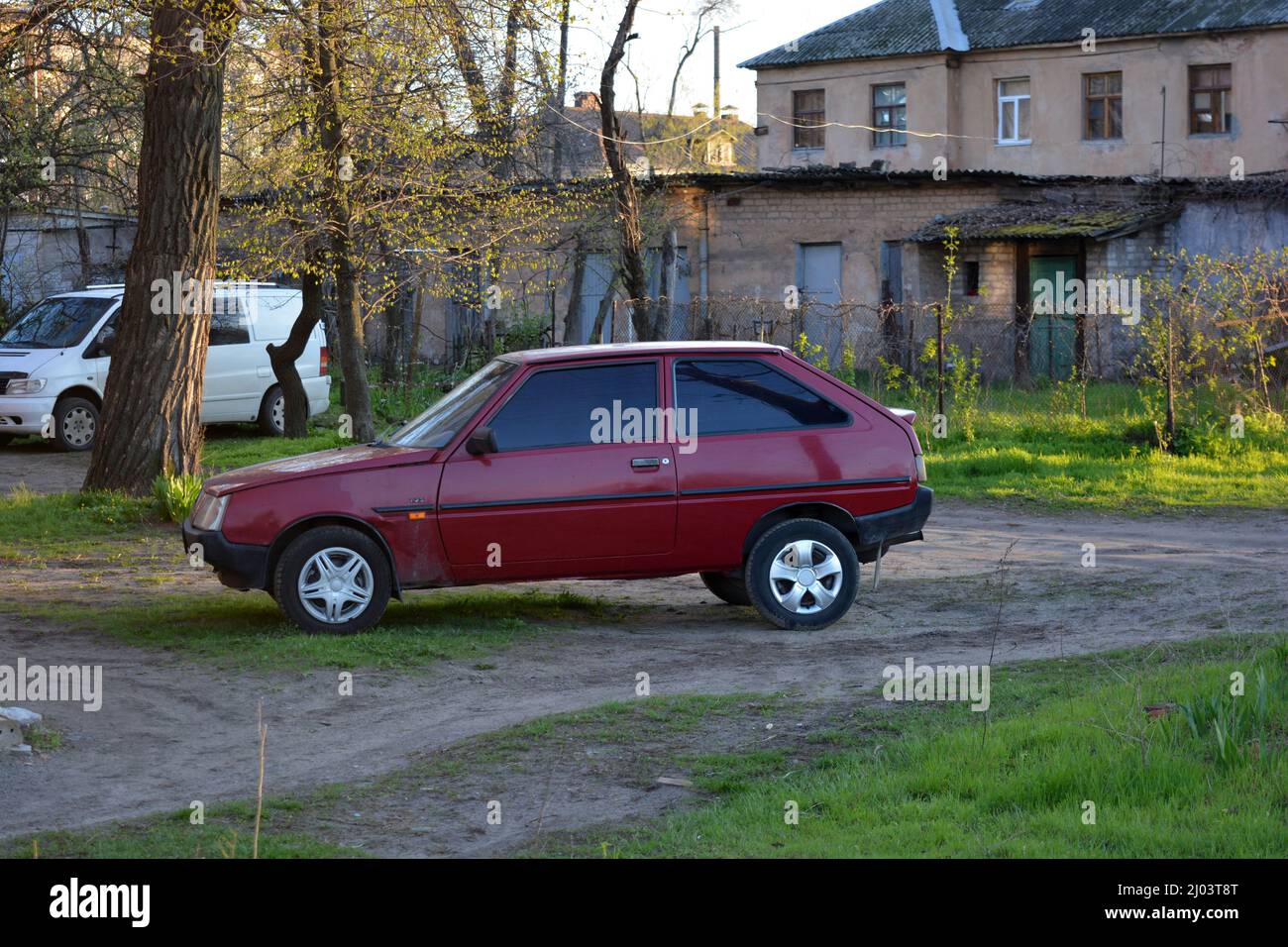 A new Ukrainian-made car stands in the courtyard of a Ukrainian house ...