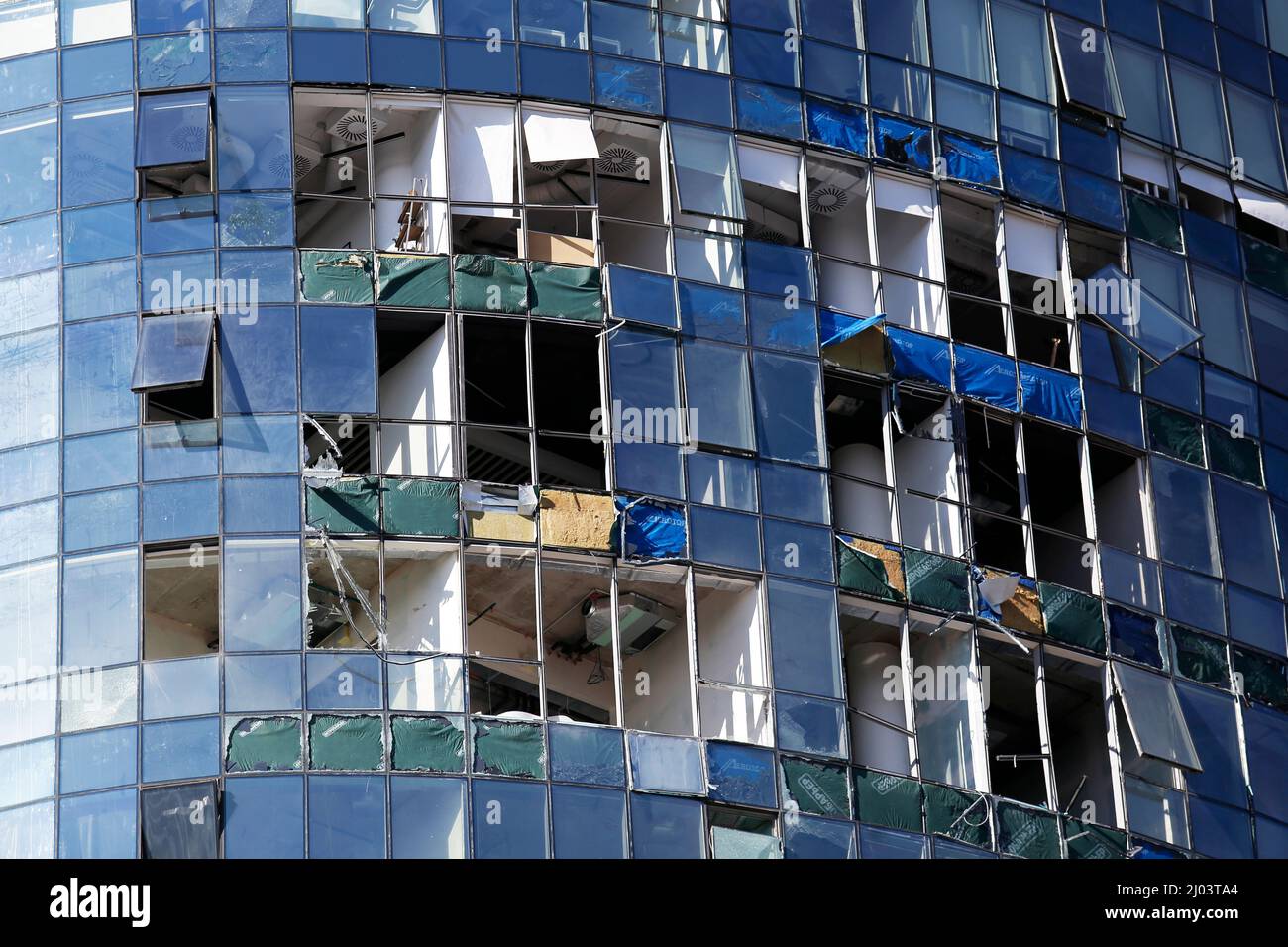 General view of a badly damaged residential building that was hit by a ...