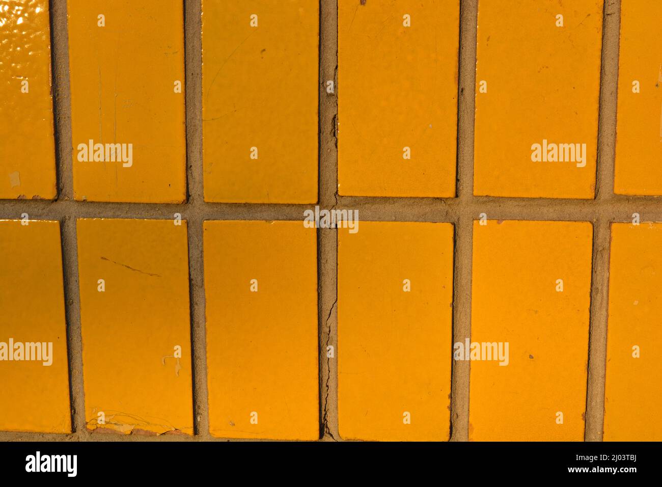 Beautiful and unusual building materials, building backgrounds. Yellow ...