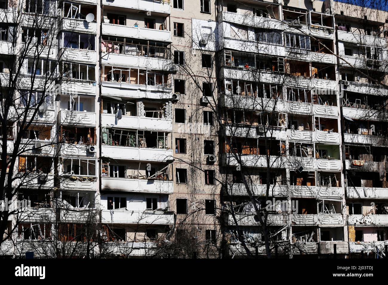 General view of a badly damaged residential building that was hit by a ...