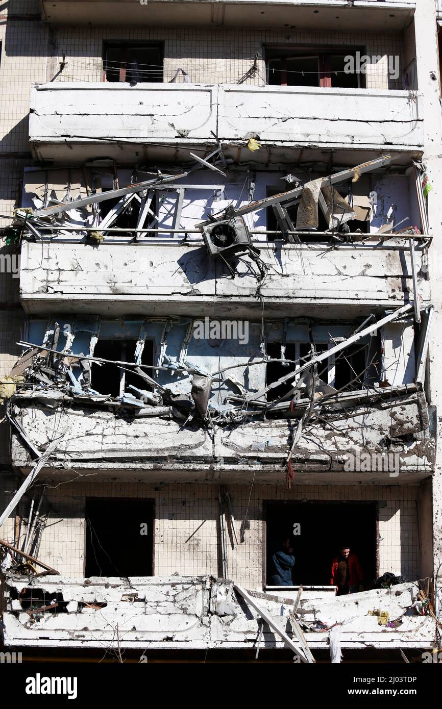 General view of a badly damaged residential building that was hit by a ...
