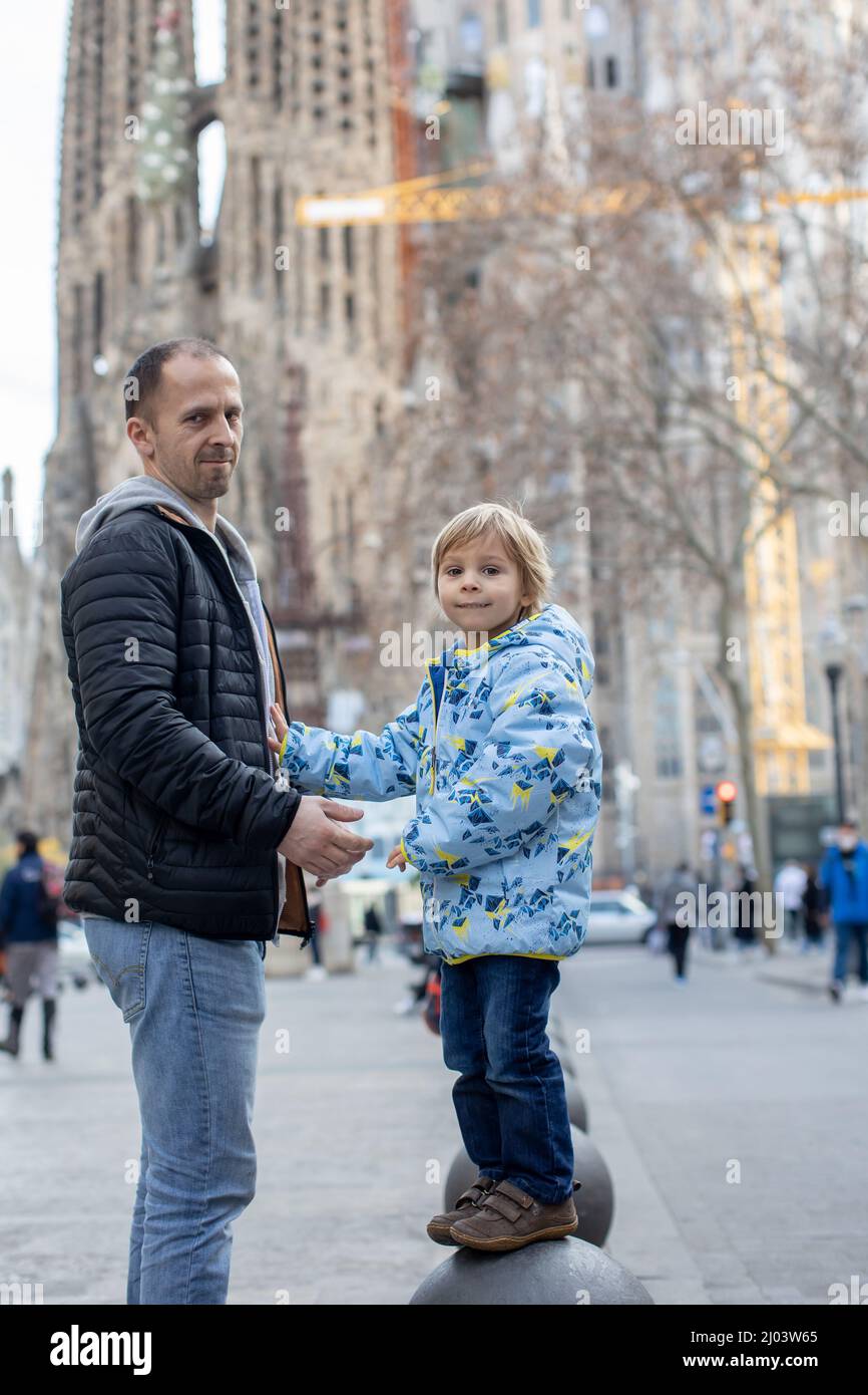 Cute little children tourists admiring Barcelona city, family travel ...