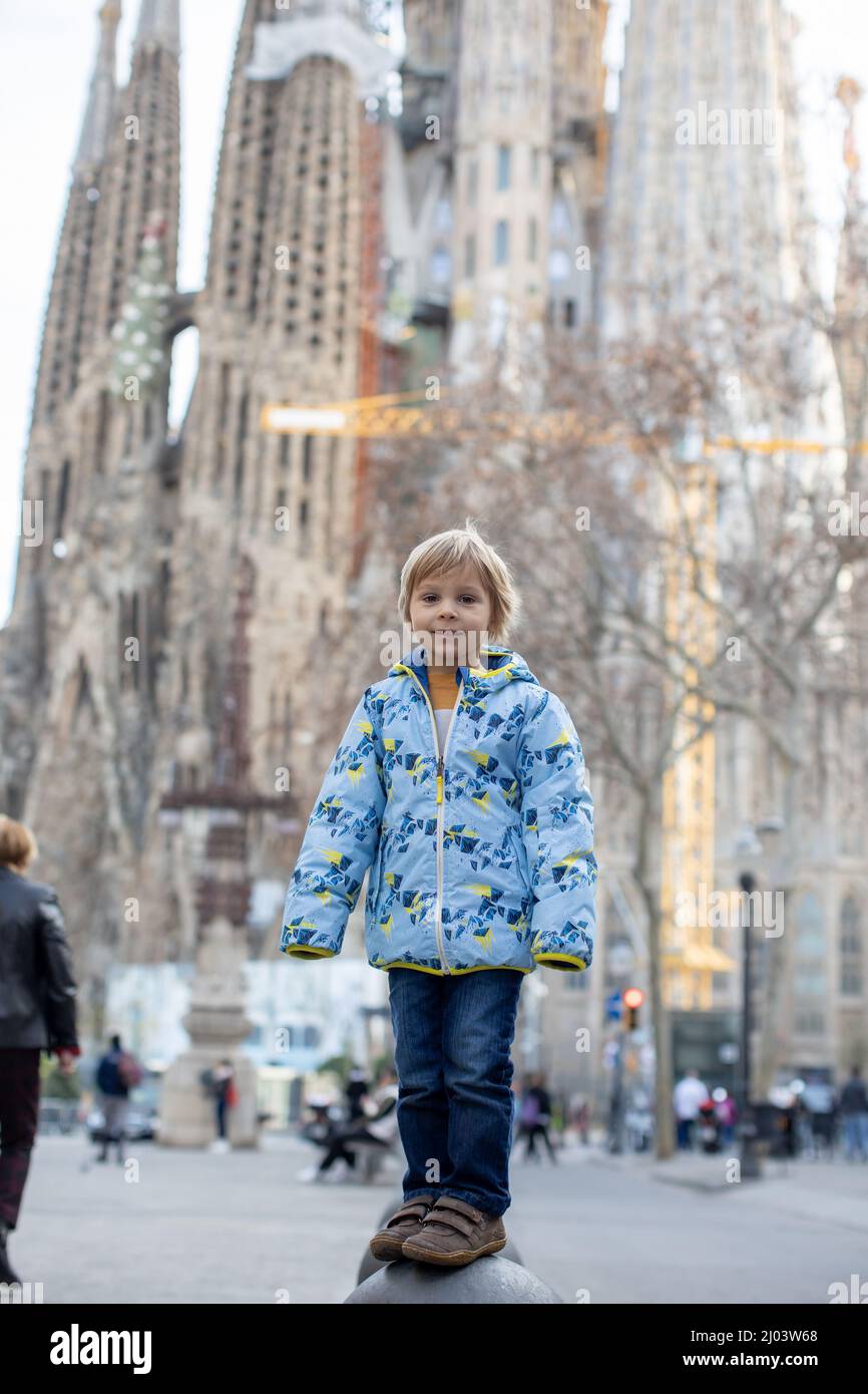Cute little children tourists admiring Barcelona city, family travel ...