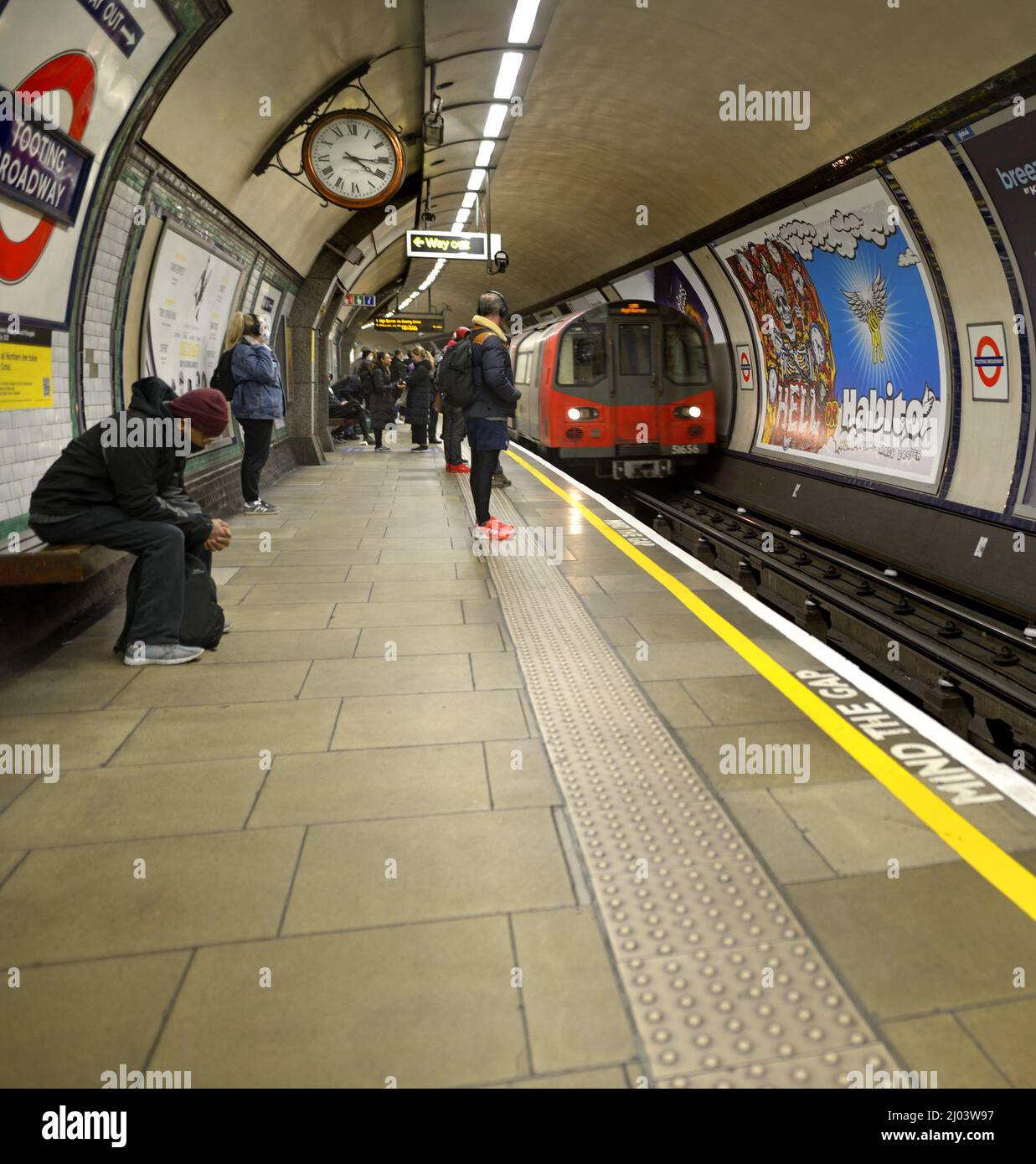 London, England, UK. Tube train arriving at Tooting Broadway ...