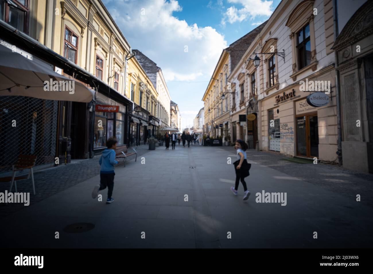 Shot of children running in Romania, Timisoara Stock Photo - Alamy