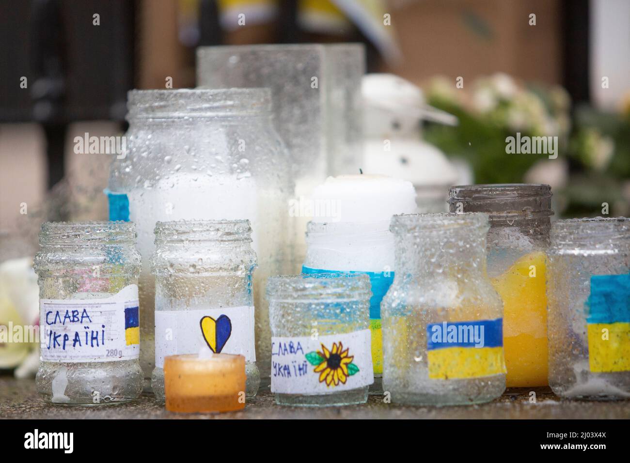 Edinburgh, UK. 16th Mar, 2022. People walk past messages of support ...