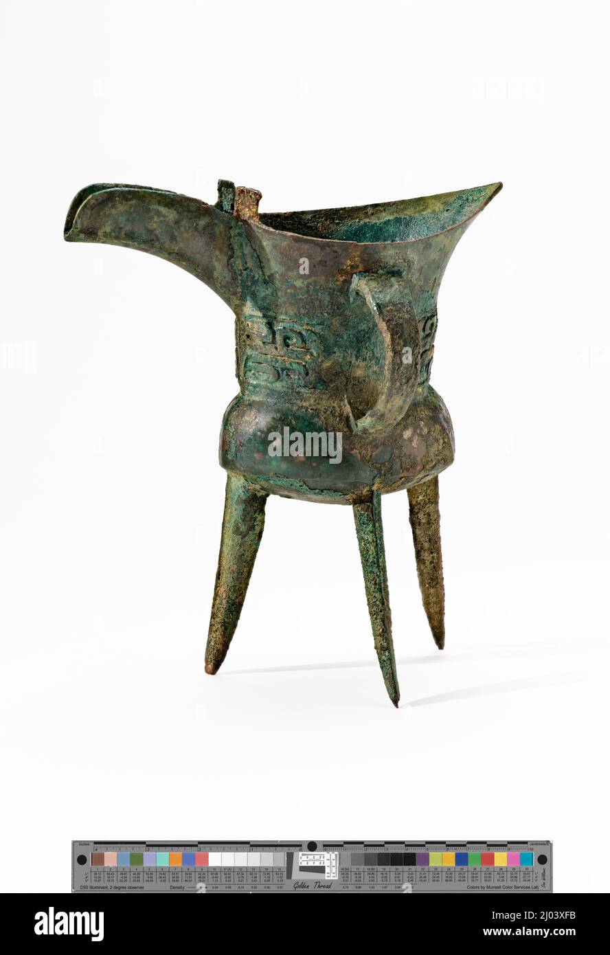 Small Ritual Wine Warmer (Jue) with Mask. China, Early Shang dynasty ...