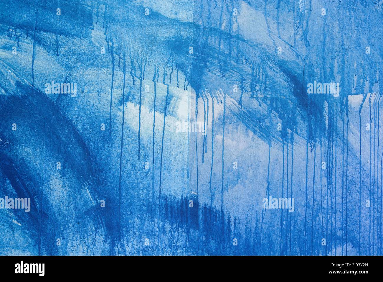 Texture of down flows of blue paint dripping down the wall. Creative ...