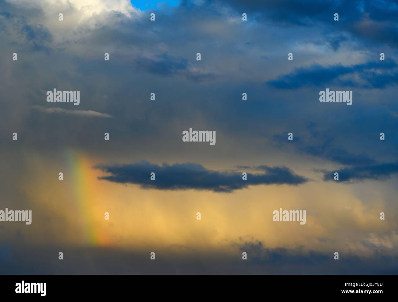 Colorful rainbow in the clouds Stock Photo - Alamy