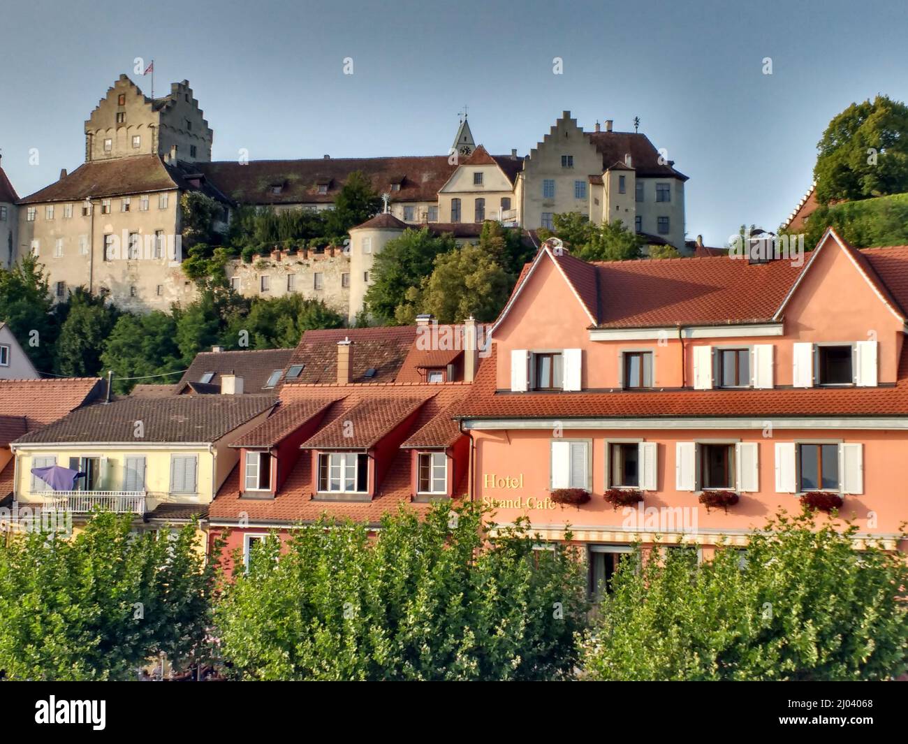 The buildings on the shore of lake Constance (Bodensee) against blue ...