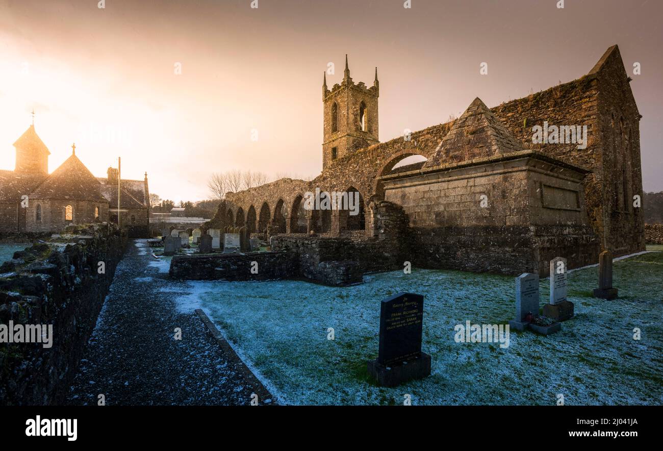Baltinglass Abbey at sunset after a light fall of snow, County Wicklow ...