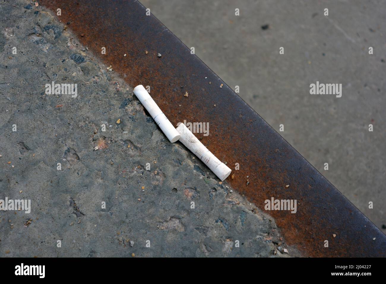 Lifestyle, smoking that kills health. A lot of half-smoked cigarettes ...