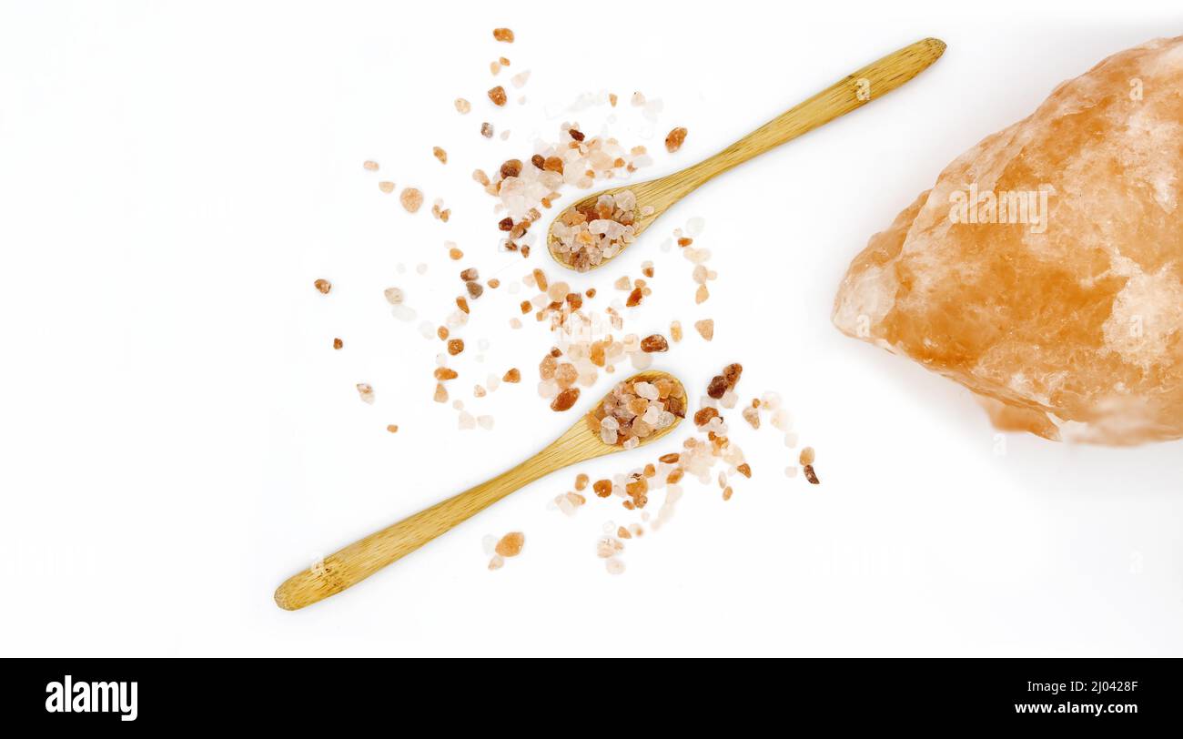 Himalayan pink salt isolated on white background Stock Photo - Alamy