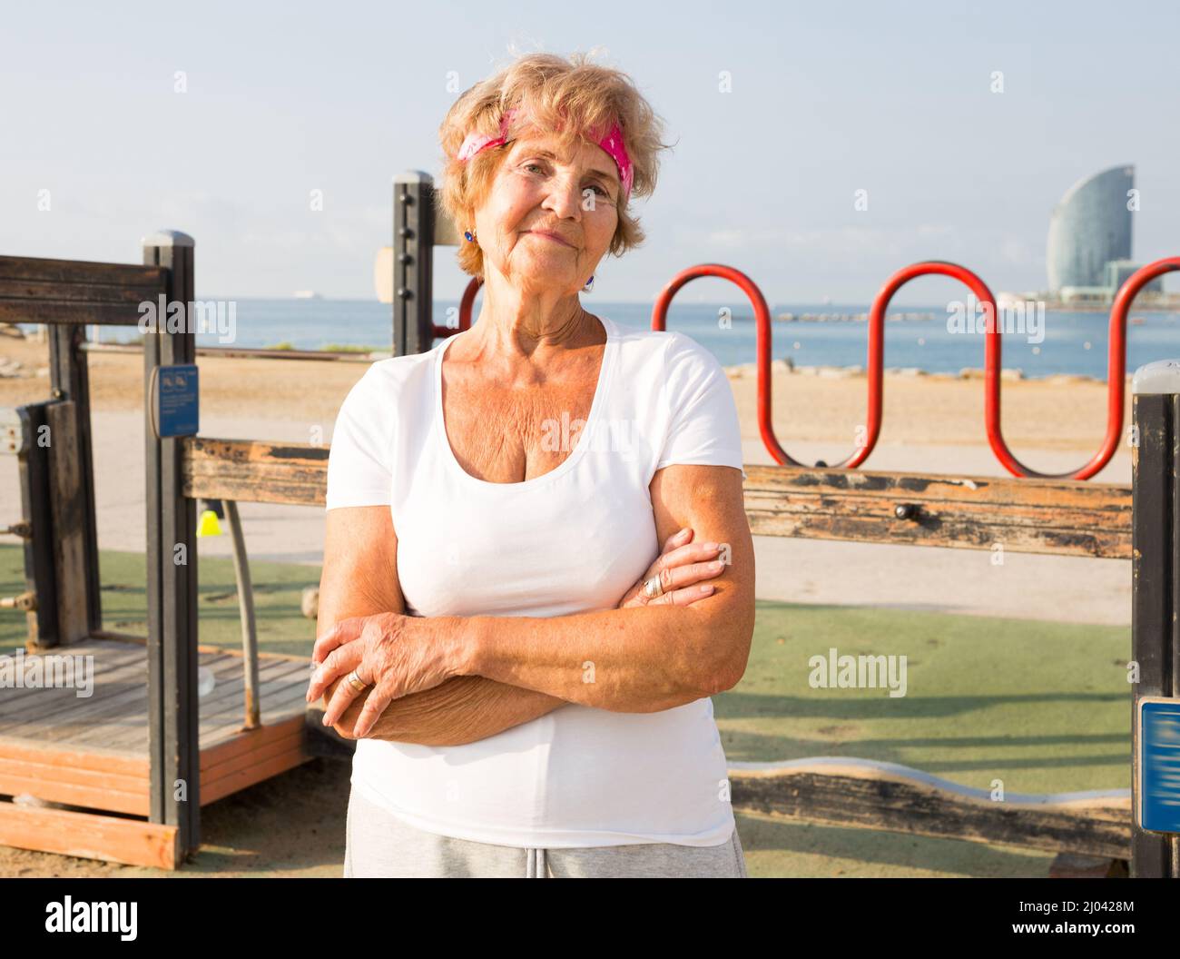 Old lady in outdoor workout station Stock Photo - Alamy