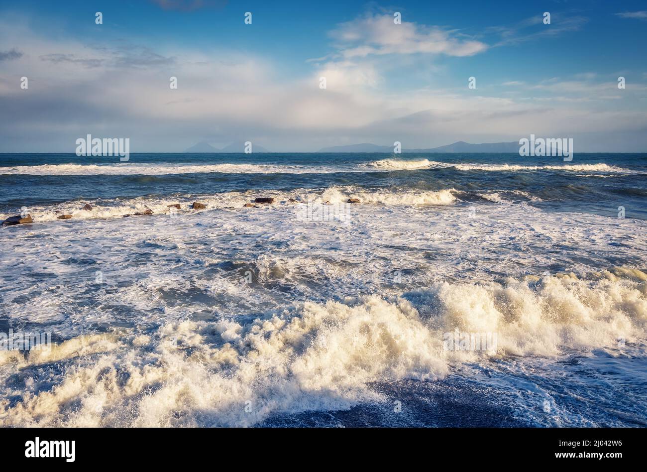 Fantastic sea view with blue sky and strong storm waves. Dramatic and ...