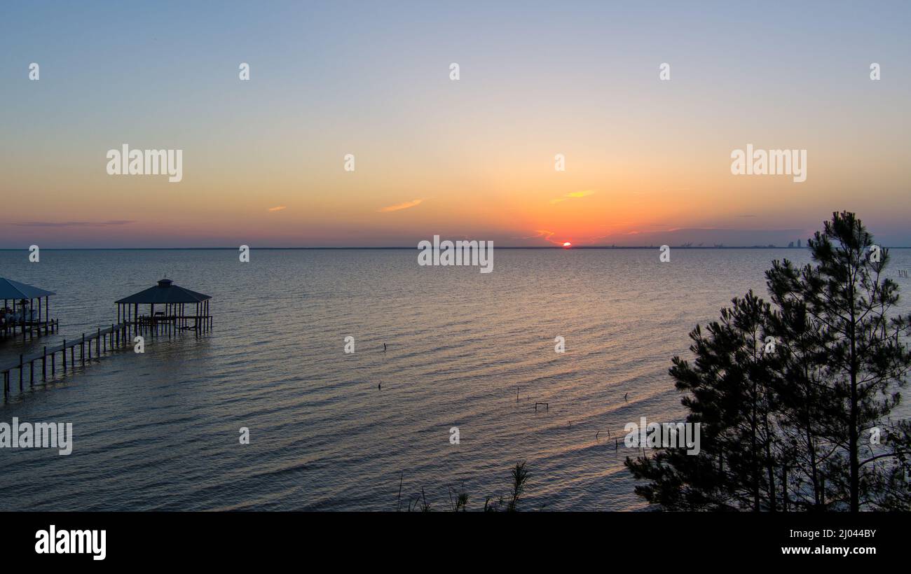 Eastern shore of Mobile Bay at sunset Stock Photo - Alamy