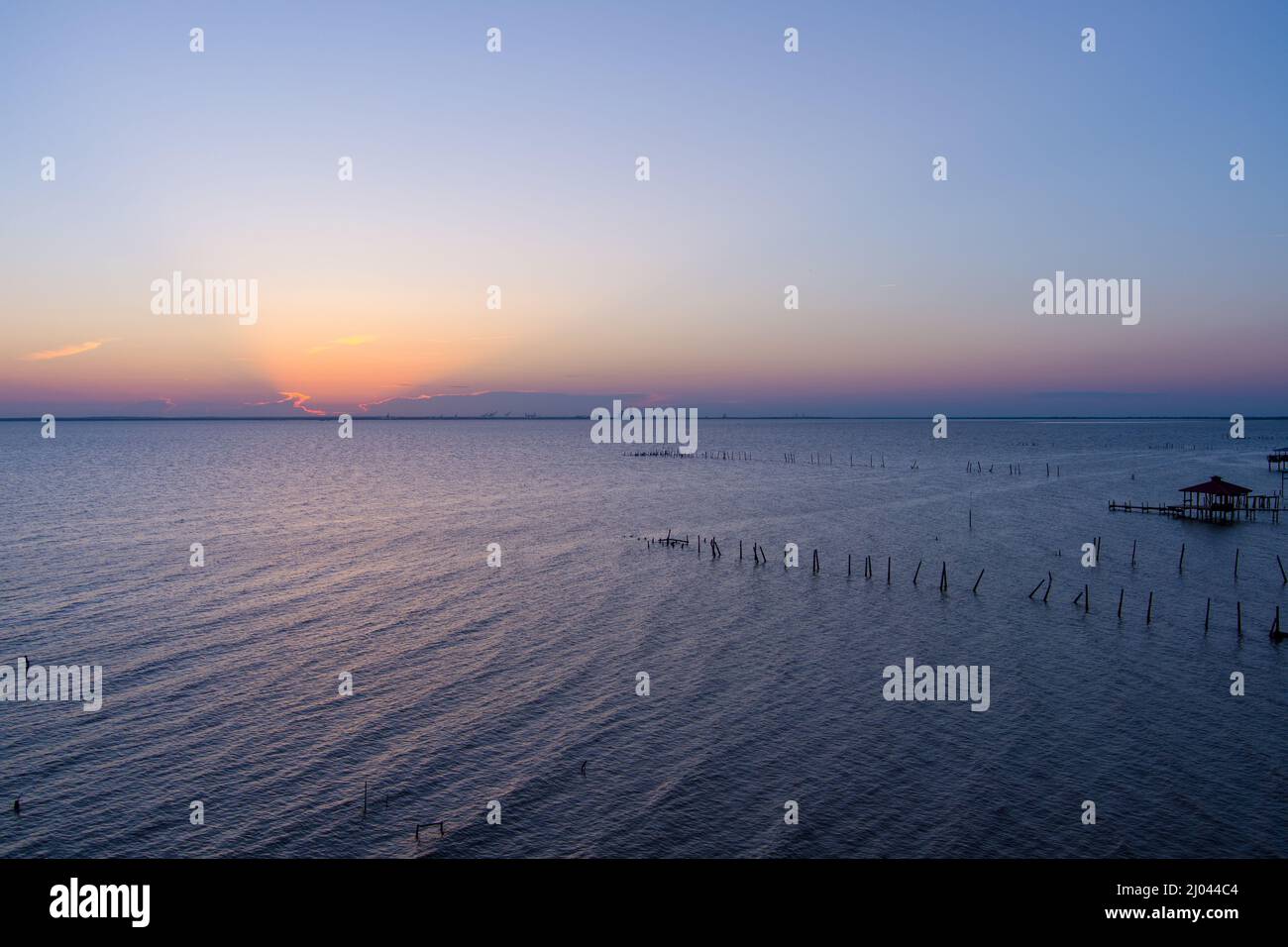 Eastern shore of Mobile Bay at sunset Stock Photo - Alamy