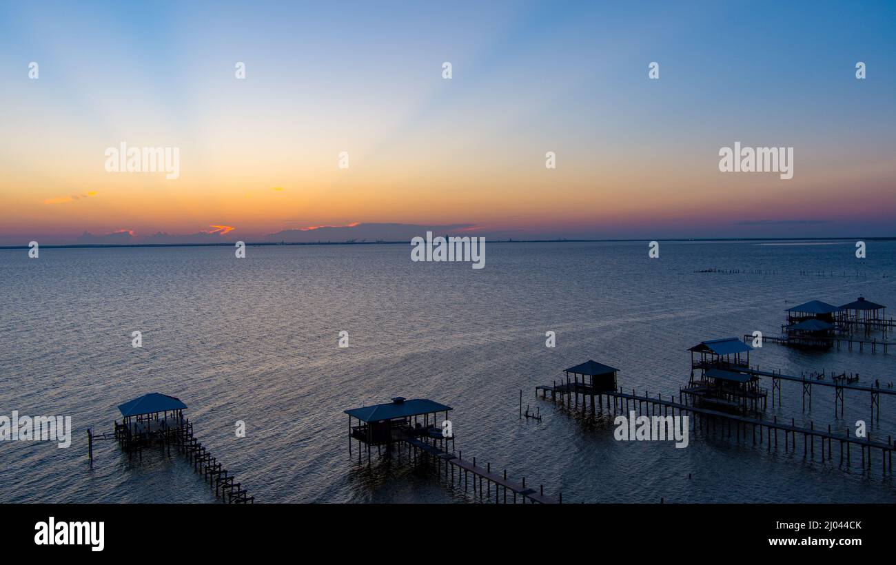 Eastern shore of Mobile Bay at sunset Stock Photo - Alamy