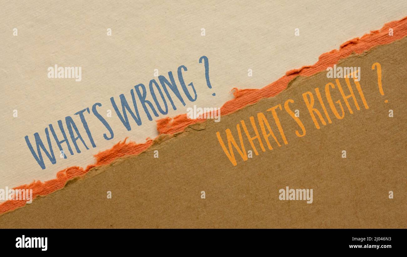 What is wrong? What is right? Handwriting on a handmade paper. Decision ...