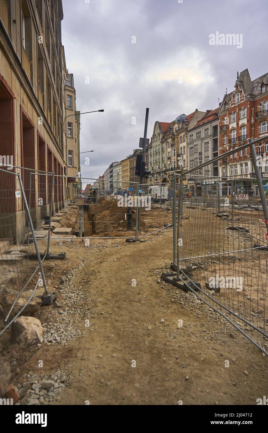 Beautiful shot of construction works with metal barriers between ...