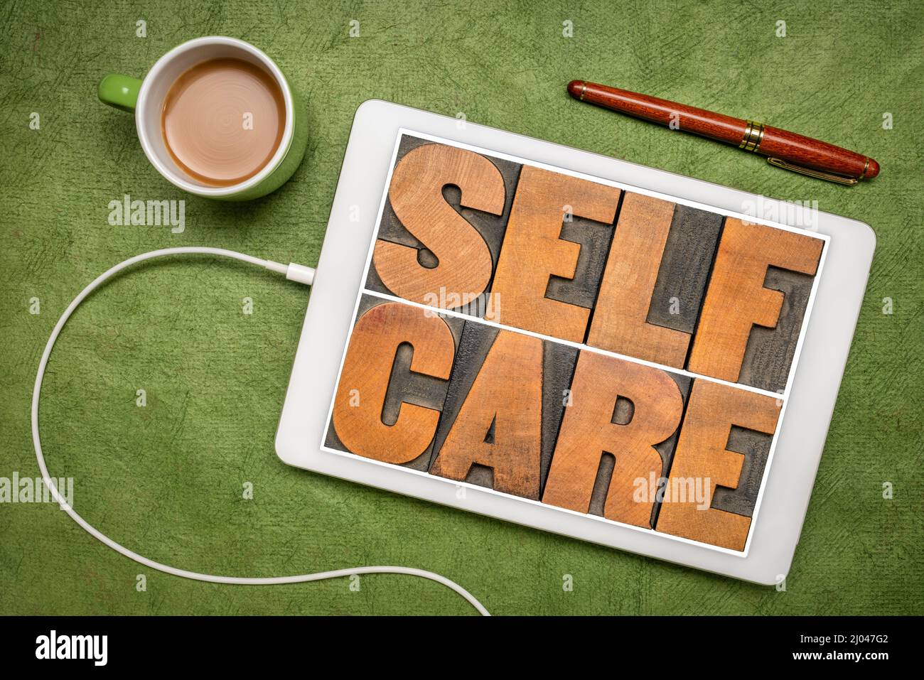 self care - word abstract in vintage letterpress wood type on a digital ...