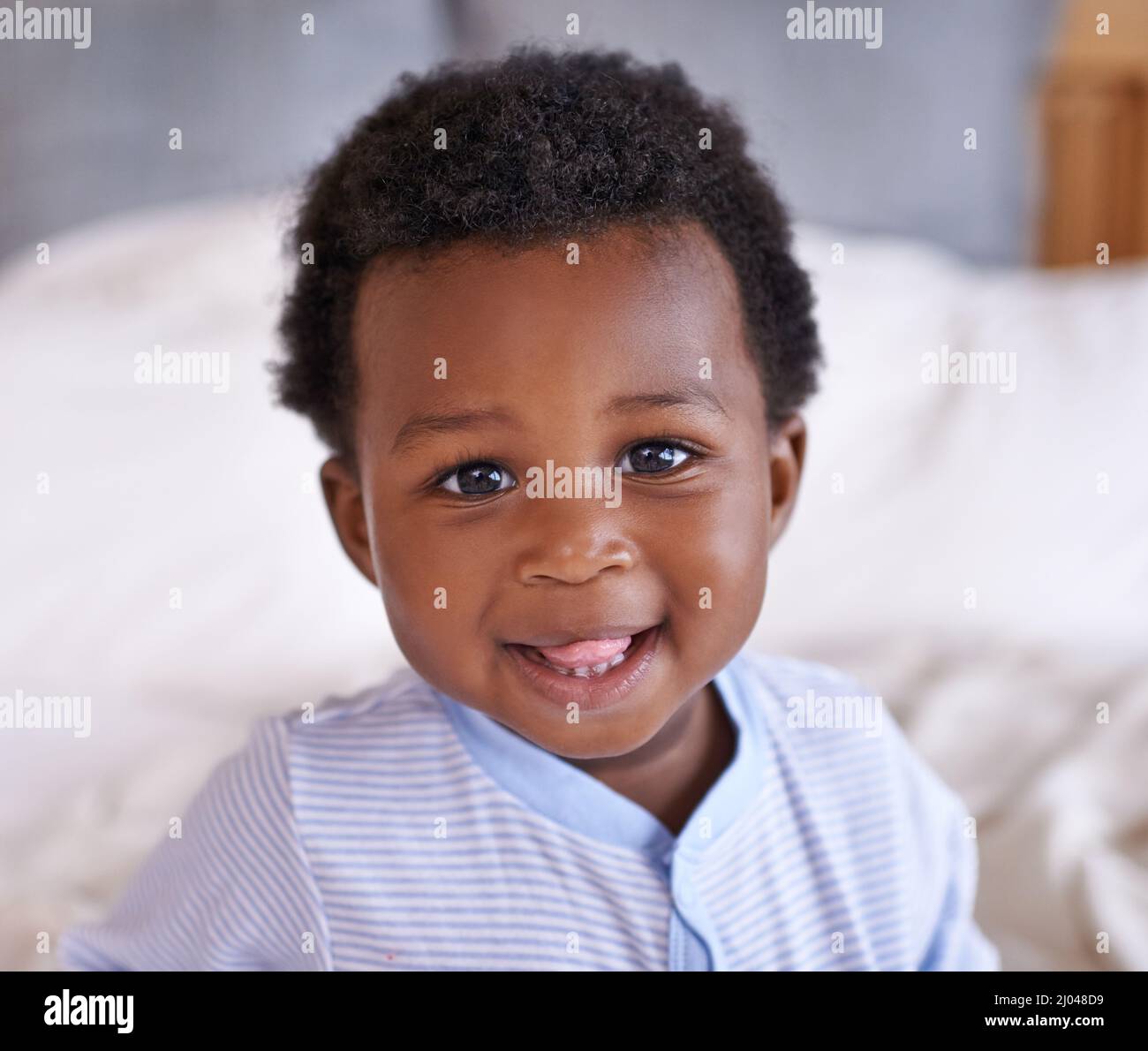 Baby at home. Shot of an adorable little baby boy at home Stock Photo ...