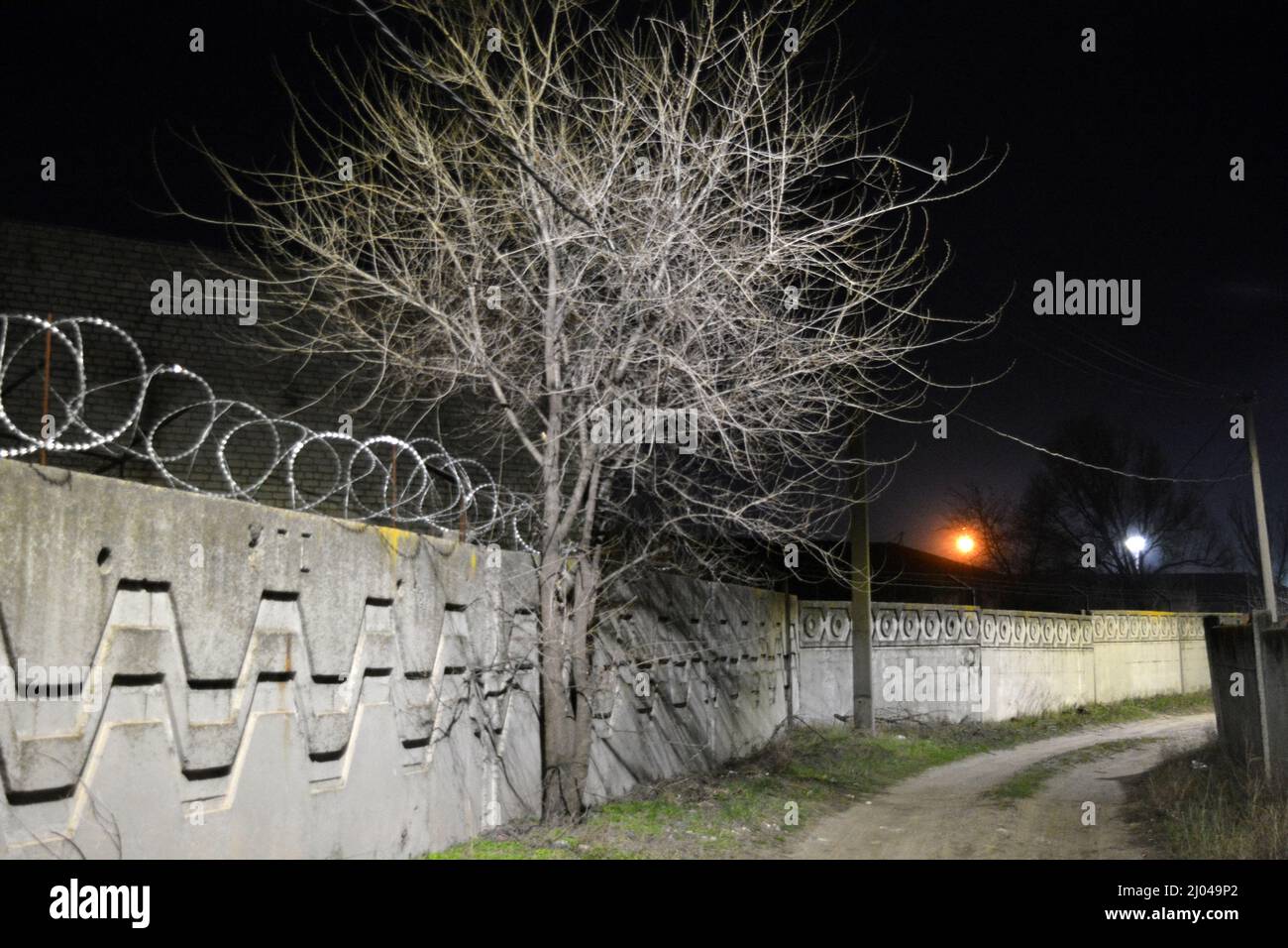Night street, dark courtyards and alleys, a residential area. High ...