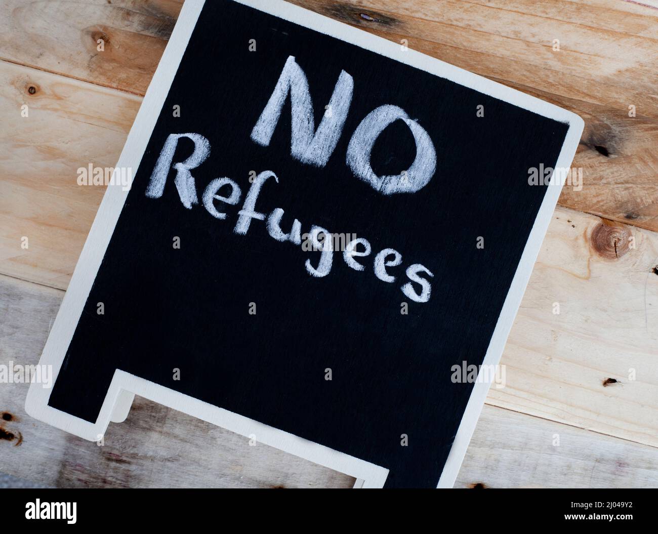 No refugees written on chalkboard Stock Photo - Alamy