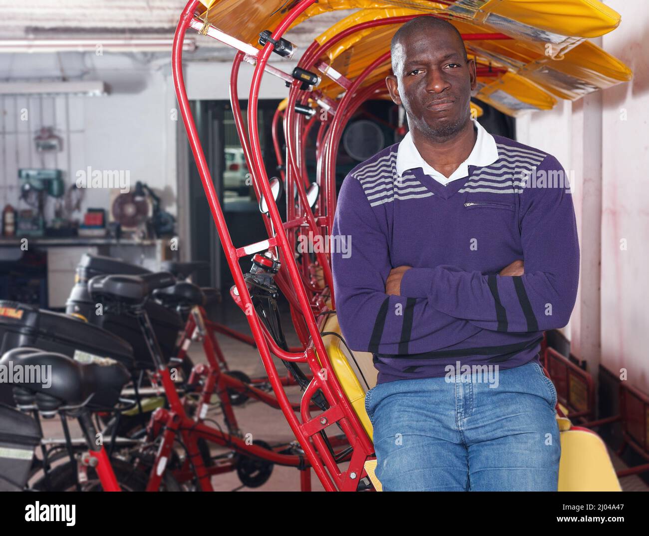 Portrait of African-American young man rickshaw cycle driver Stock ...