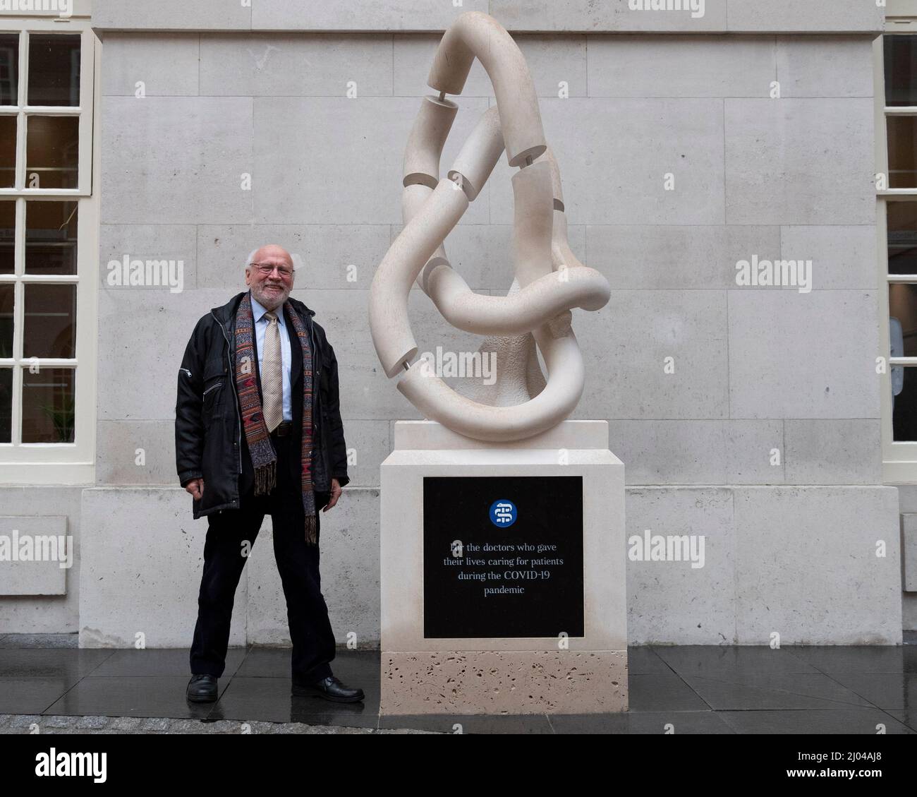 Sculptor Richard Tannenbaum with his sculpture in remembrance of the ...